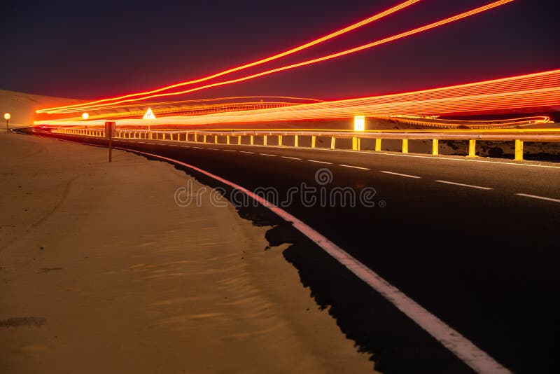 Asphalt Road Running through the Sandy Desert at Night Editorial Stock ...