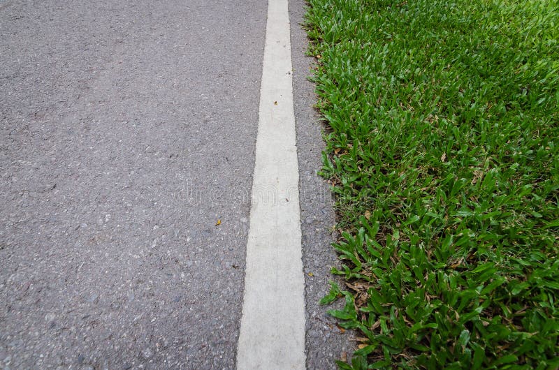 Asphalt Road with Strip Line and Green Grass Stock Photo - Image of ...