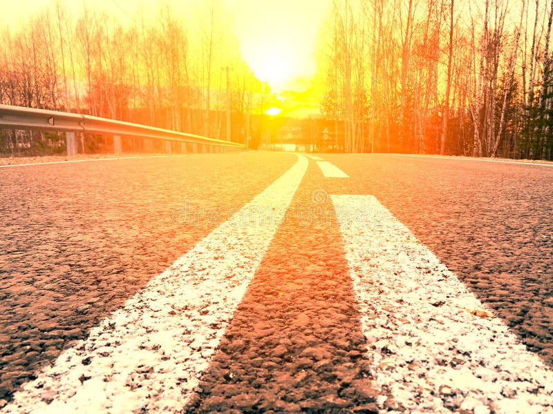 Asphalt road in sunshine stock image. Image of line - 249006339