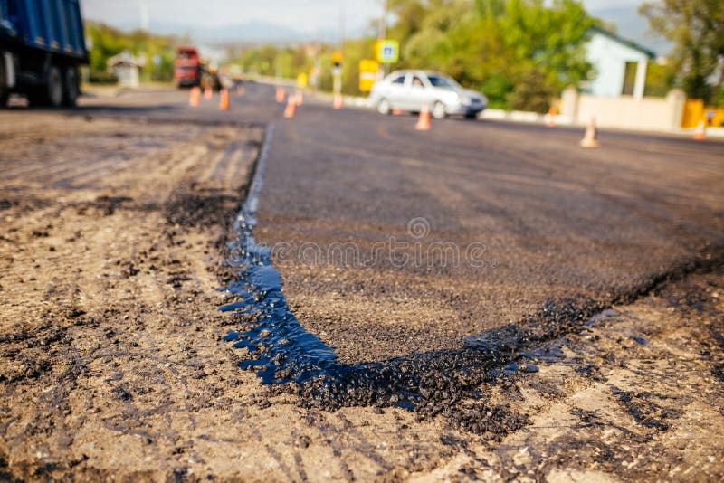 Asphalt Road Texture. Laying a New Asphalt on the Road Stock Photo ...