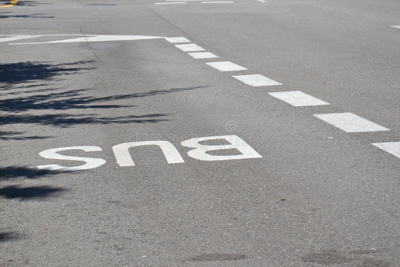 Asphalt Road Texture with a Bus Stop Sign in a Sunny Day Barcelona ...