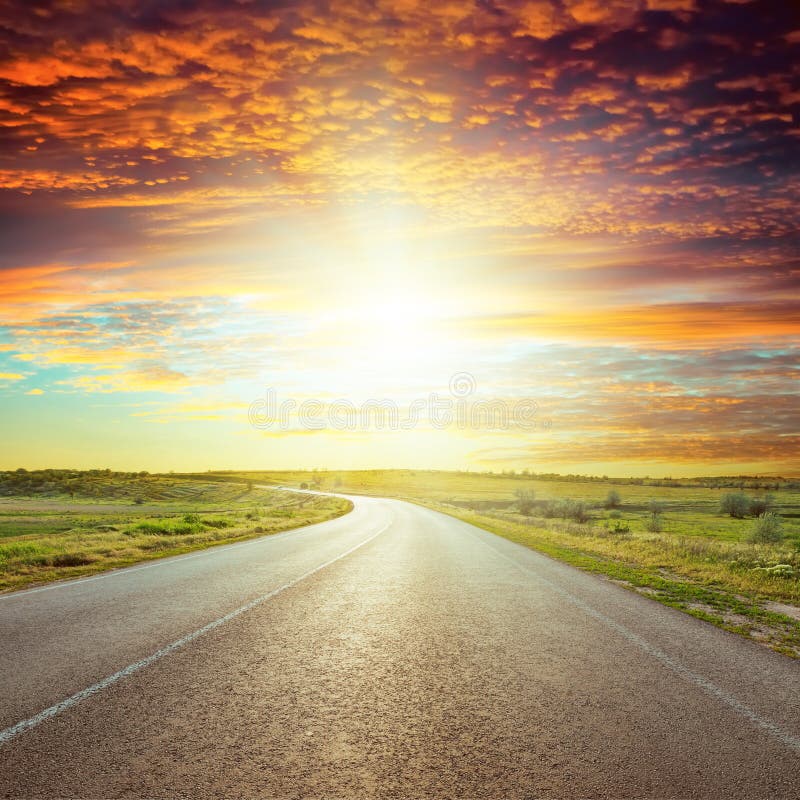 Asphalt Road To Horizon and Sunset in Clouds Stock Image - Image of ...