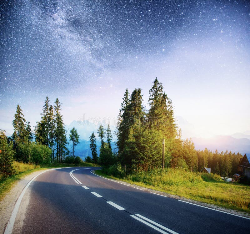 Asphalt Road Under a Starry Night Sky and the Milky Way Stock Photo ...