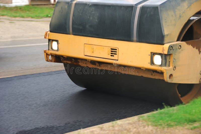 Asphalt paving machine stock image. Image of pave, roll - 12185873