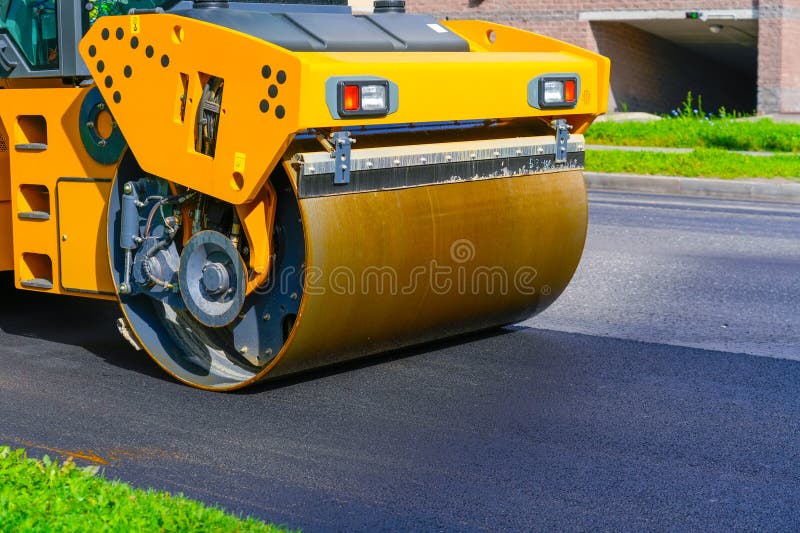 Asphalt Roller Working on Pavement of a Road Stock Image - Image of ...