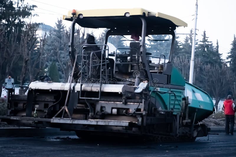 Asphalt Smoothing and Road Repairing Machine Stock Photo - Image of ...