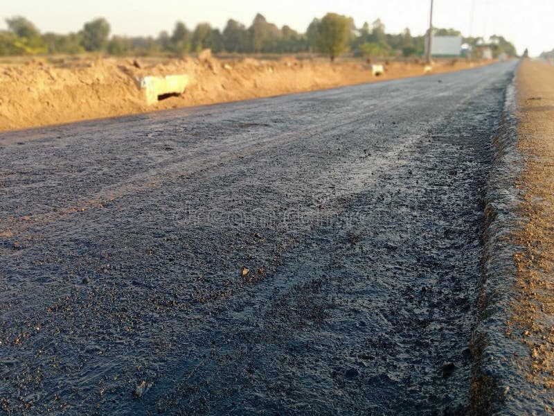 Rubber Spraying for Preparation of Pavement in Road Construction Stock ...