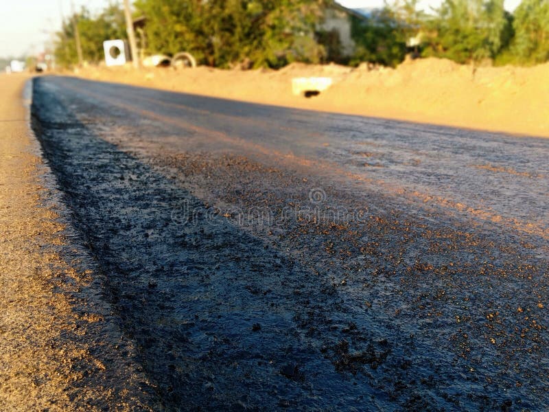 Rubber Spraying for Preparation of Pavement in Road Construction Stock ...