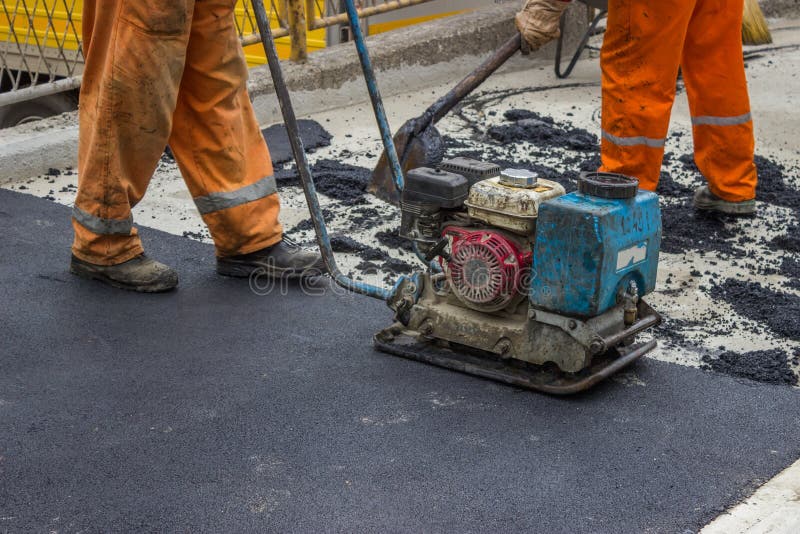 Asphalt Worker with Compactor Plate 5 Stock Image - Image of gloves ...
