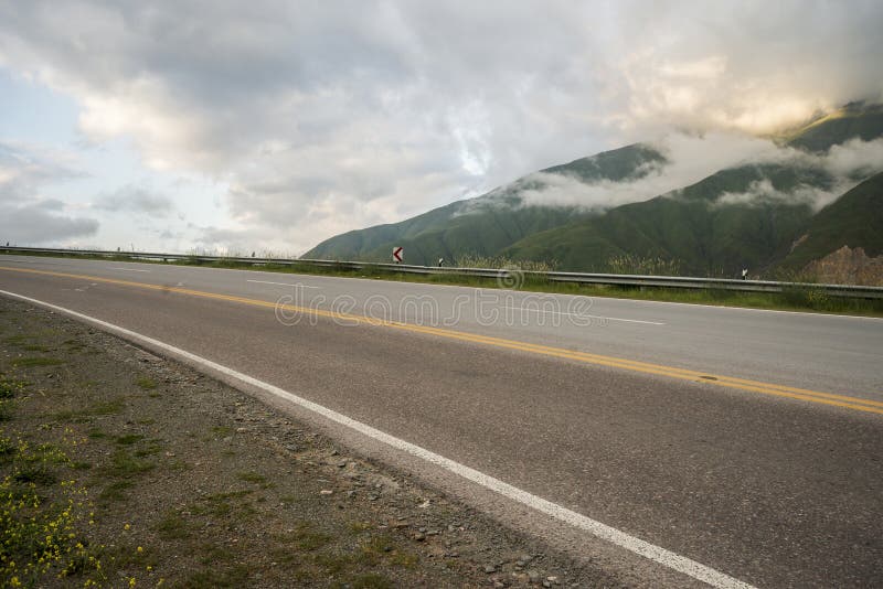 Asphalted Road that Ascends between the Mountains Stock Image - Image ...