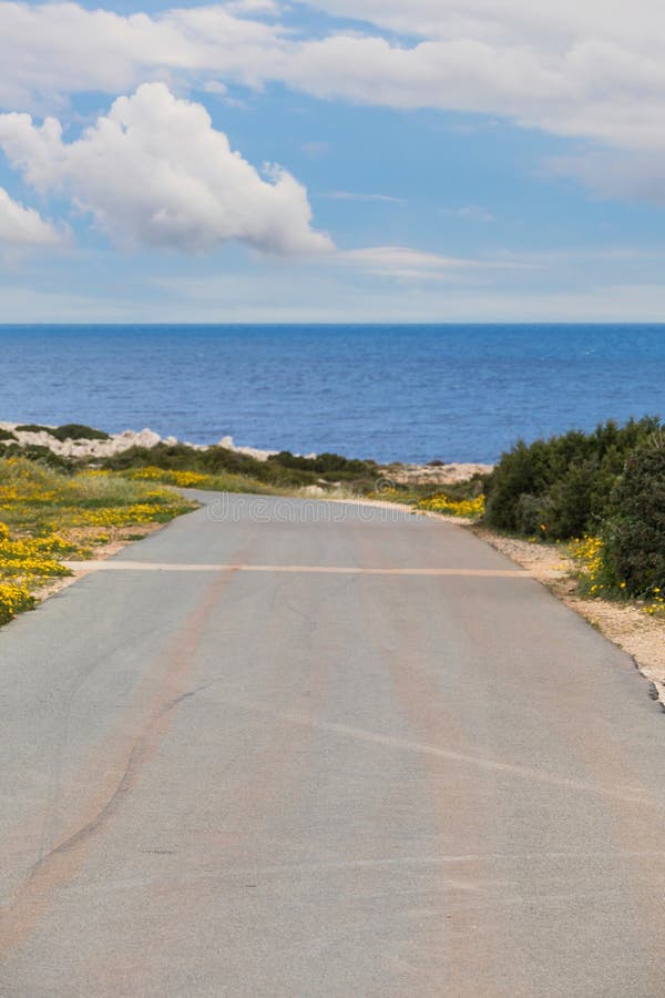 Asphalted Road in the Mountains, Background Blurred Blue Sky and Sea ...