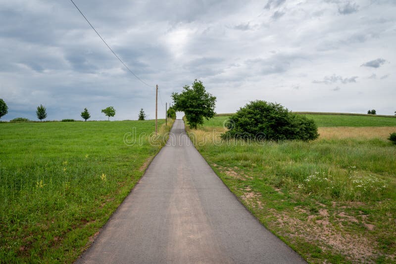 Asphalted Walk and Bike Path on a Hill Stock Image - Image of land ...