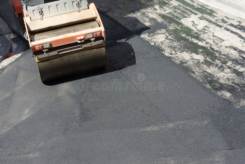 Asphalting work concept stock image. Image of paving - 166212781