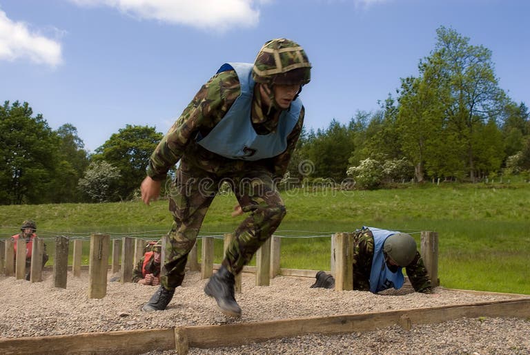 Assault course sprint stock photo. Image of camouflage - 1051680