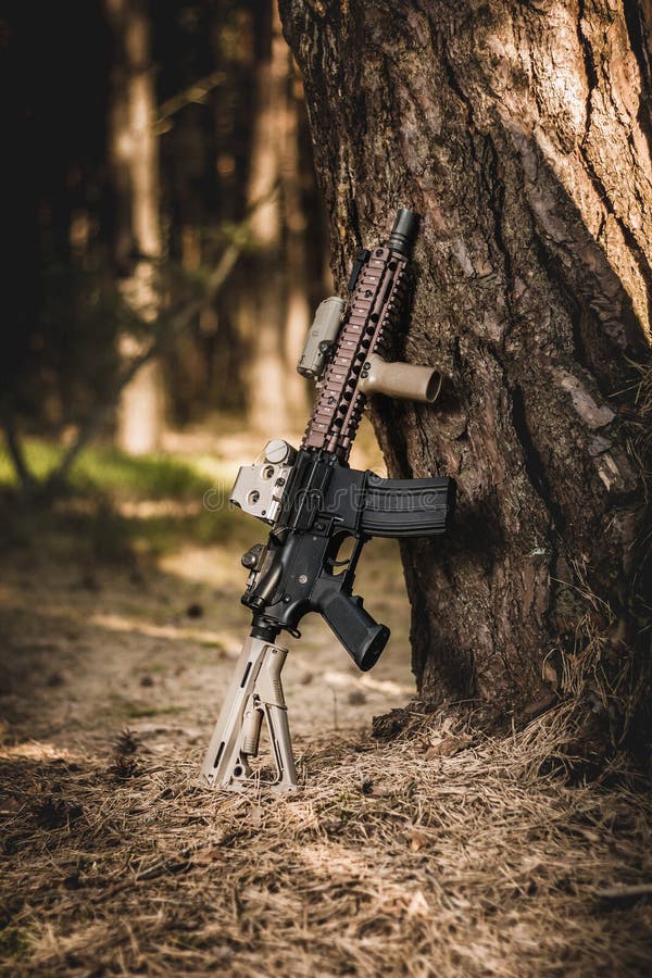 Assault Rifle on the Forest Background Stock Image - Image of ...