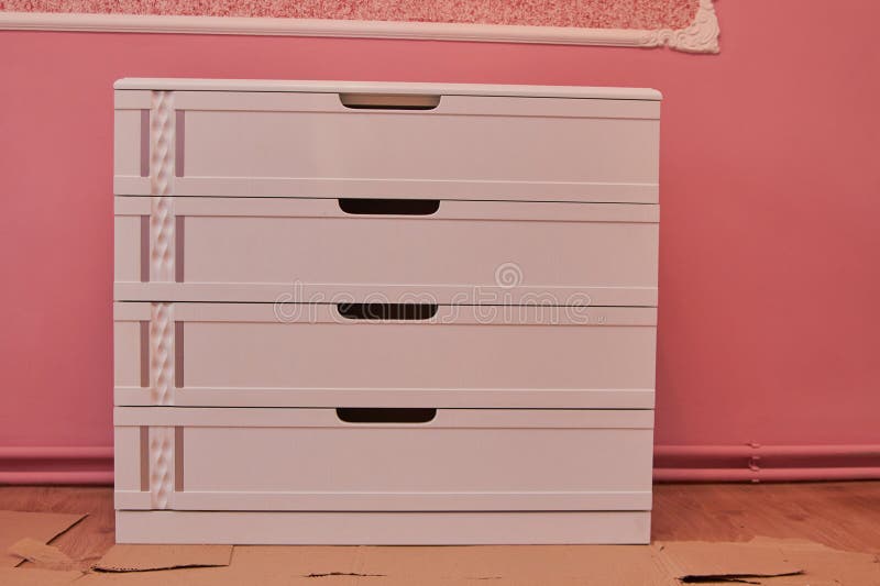 Assembled Chest of Drawers, a White Chest of Drawers Stands Assembled ...