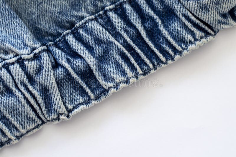Assembled Fabric in a Rubber Band. Blue Denim on White Background ...