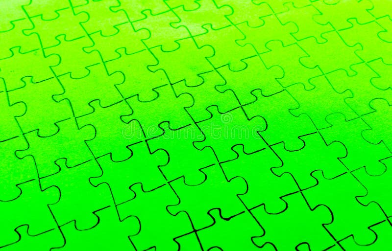 Assembled Puzzle on a Bright Green Background Stock Image - Image of ...