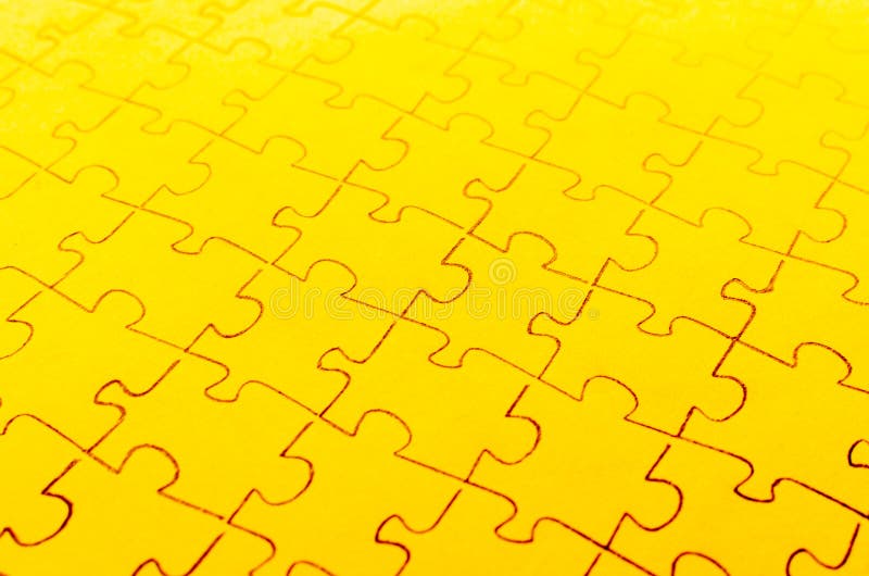 Assembled Puzzle on a Bright Yellow Background Stock Photo - Image of ...