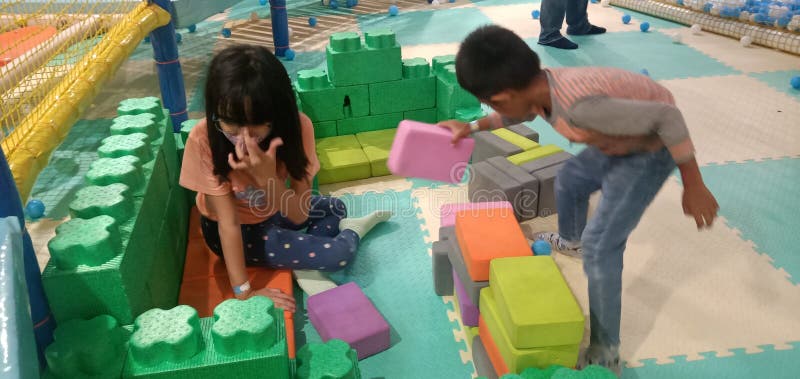 Assembling Blocks editorial stock photo. Image of styrofoam - 266160833