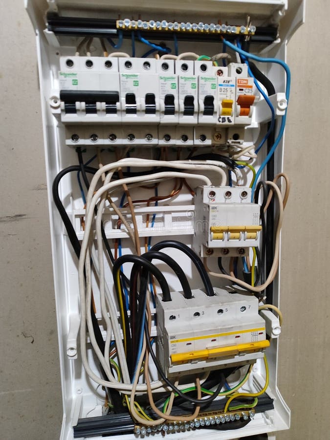 Assembling the Electrical Panel. the Engineer Makes the Connections of ...