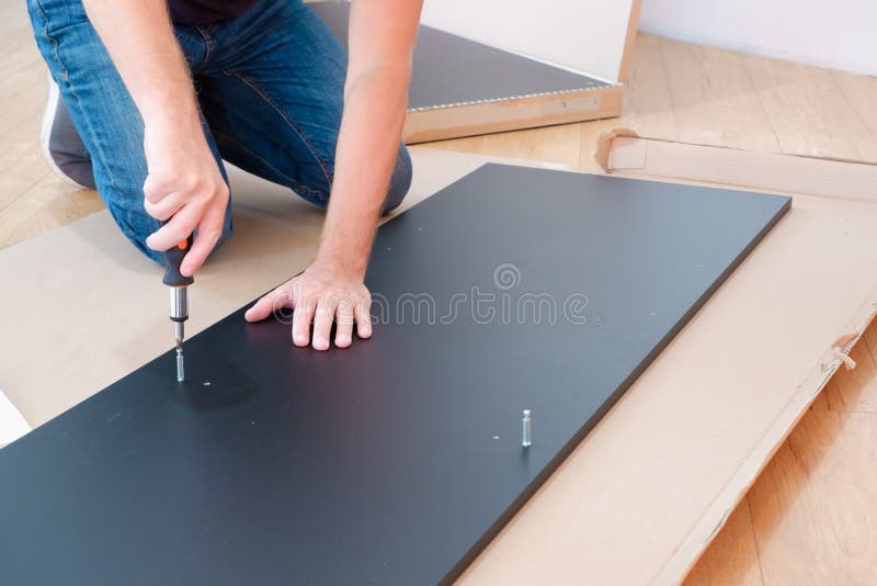 Assembling Furniture Furniture Assembly Worker Assembles Shelf