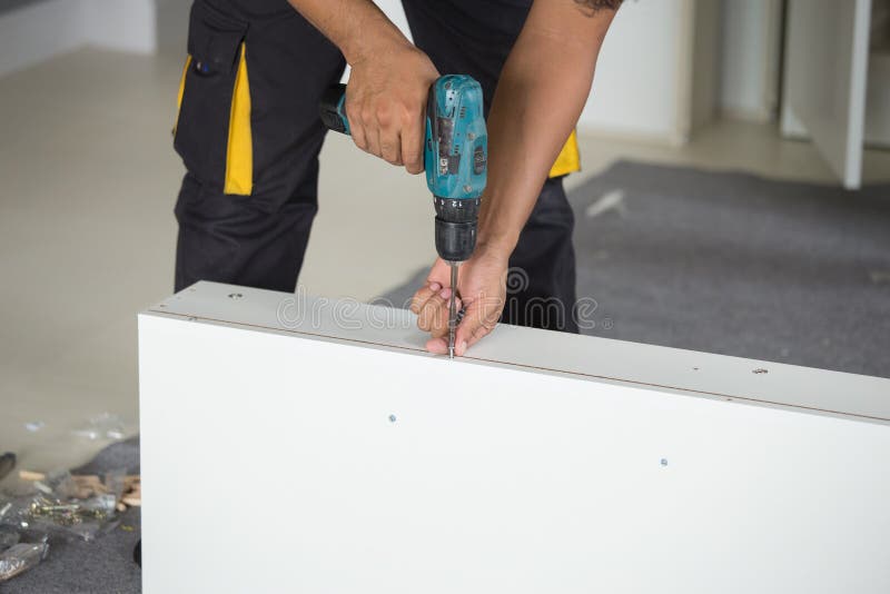 Assembling Furniture with a Screwdriver Stock Photo - Image of drilling ...