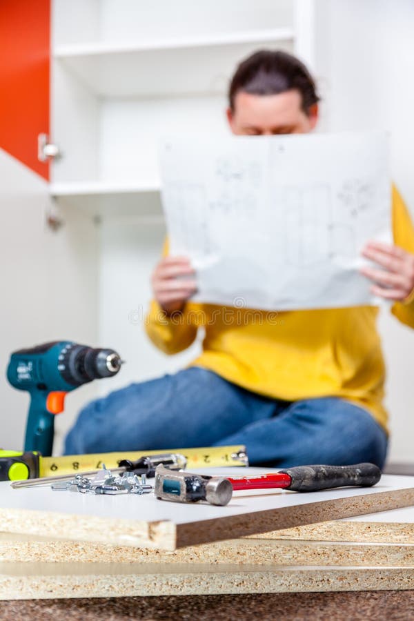 Assembling furniture stock image. Image of interior, assembly - 32393739