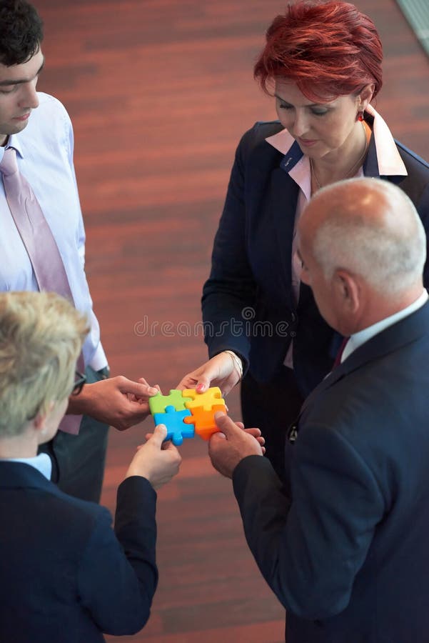 Assembling jigsaw puzzle stock image. Image of love, abstract - 63327451