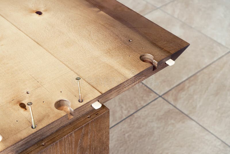 Assembling of Wooden Dining Table with Worktop Connectors Stock Photo ...