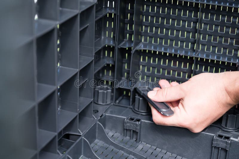 Assembling Modular Plastic Storage System. Easy-to-use Connectors ...