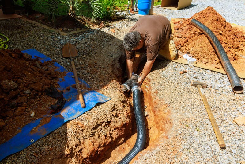 Assembling Perforated Flexible Drain Pipes for Draining Rainwater at a ...