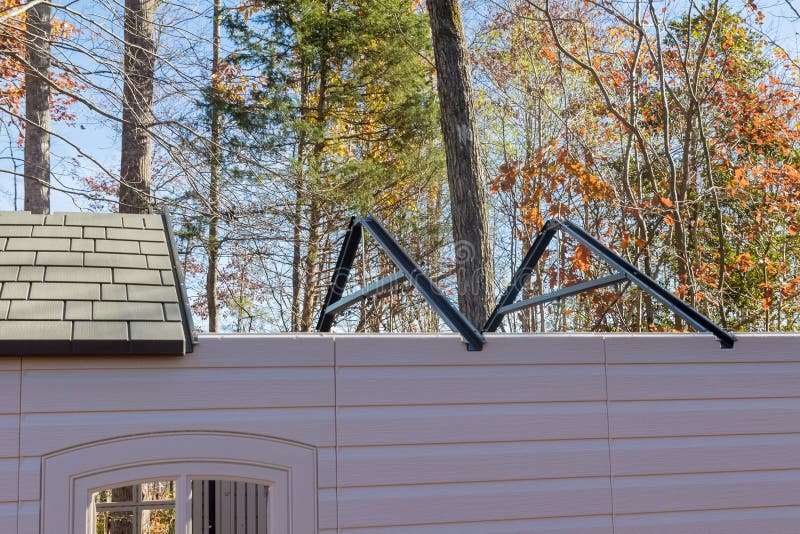 Assembling a Plastic Shed To Put in the Back Yard is a Big Task Stock ...