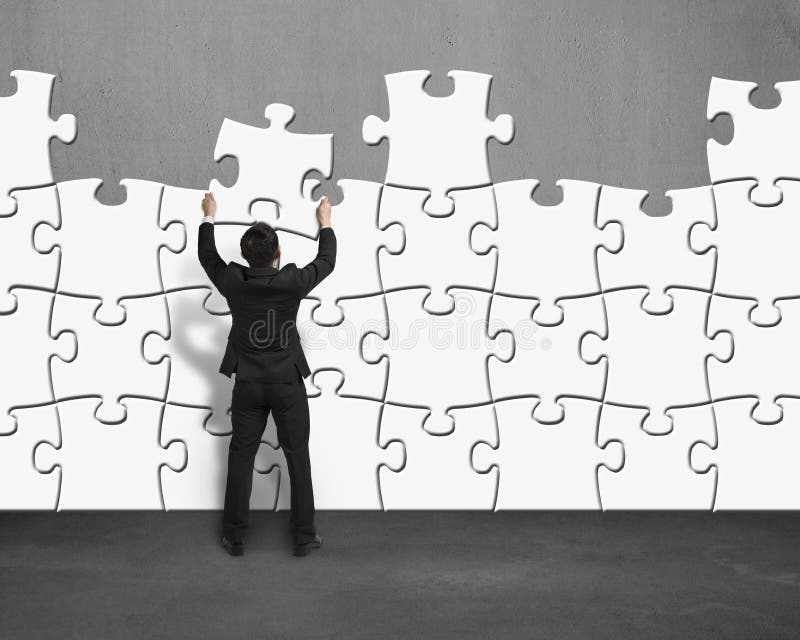 Businessman Figuring Out Puzzle Pieces Stock Image - Image of graphic ... Businessman Figuring Out Puzzle Pieces Stock Image - Image of graphic ...
