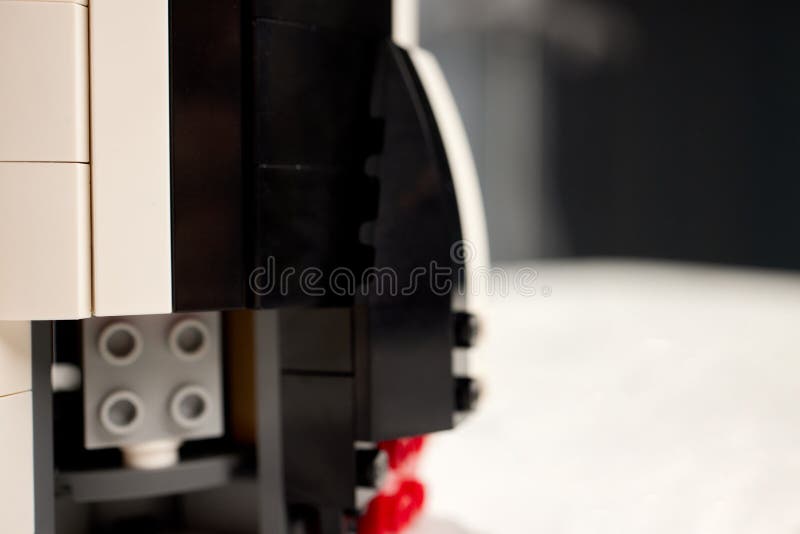 Assembling a Rocket Constructor. Colored Plastic Small Blocks. Stock ...