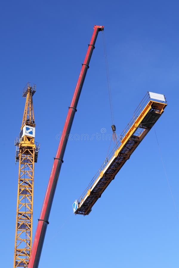 Assembling Tower Crane Using a Mobile Crane. Stock Image - Image of ...