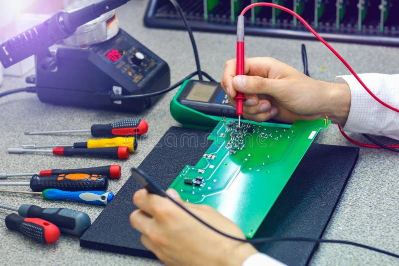 Checking the Electronic Device. Assembly of Electronic Boards Stock ...