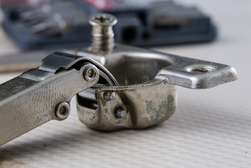 Assembly of Hinges in a Carpentry Workshop. Joinery Accessories Stock ...