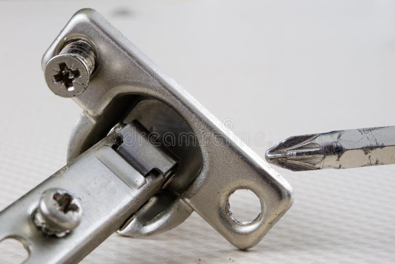 Assembly of Hinges in a Carpentry Workshop. Joinery Accessories Stock ...