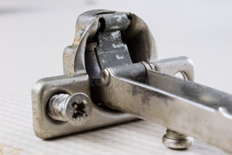 Assembly of Hinges in a Carpentry Workshop. Joinery Accessories Stock ...
