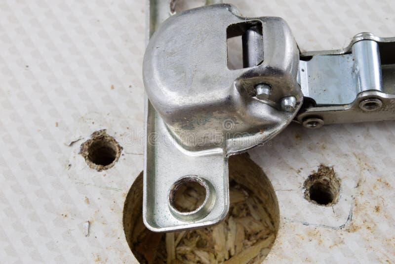 Assembly of Hinges in a Carpentry Workshop. Joinery Accessories Stock ...