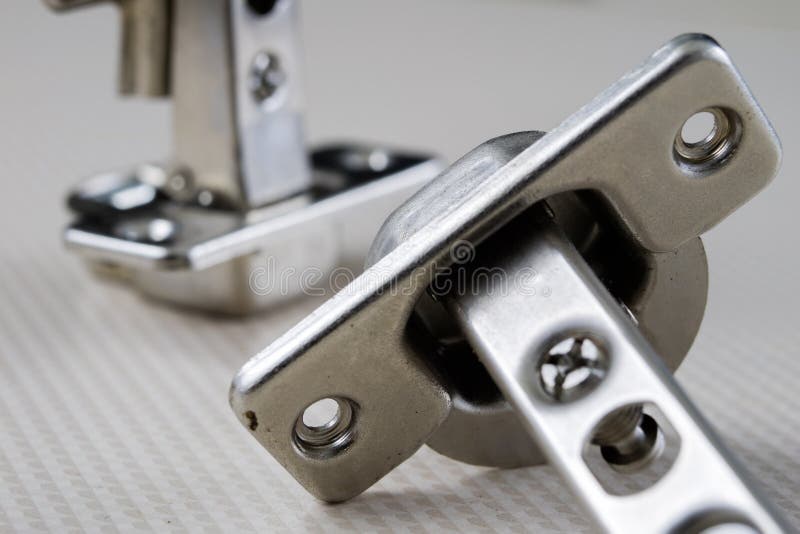 Assembly of Hinges in a Carpentry Workshop. Joinery Accessories Stock ...