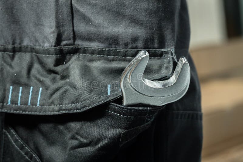 An Assembly Key in the Pocket of a Professional Trousers Stock Image ...