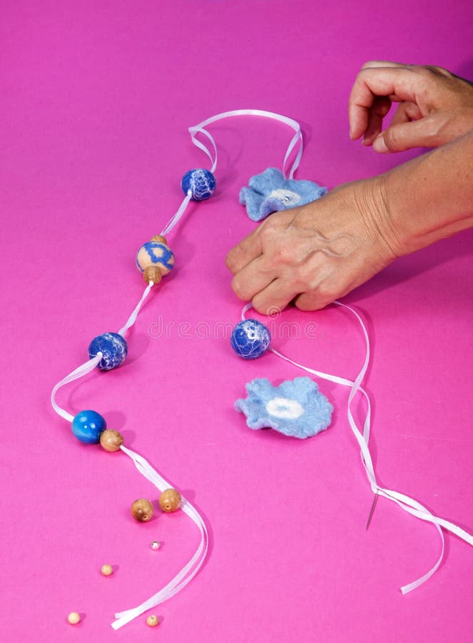 Assembly of the Master Beads of Felted Wool Stock Photo - Image of hand ...