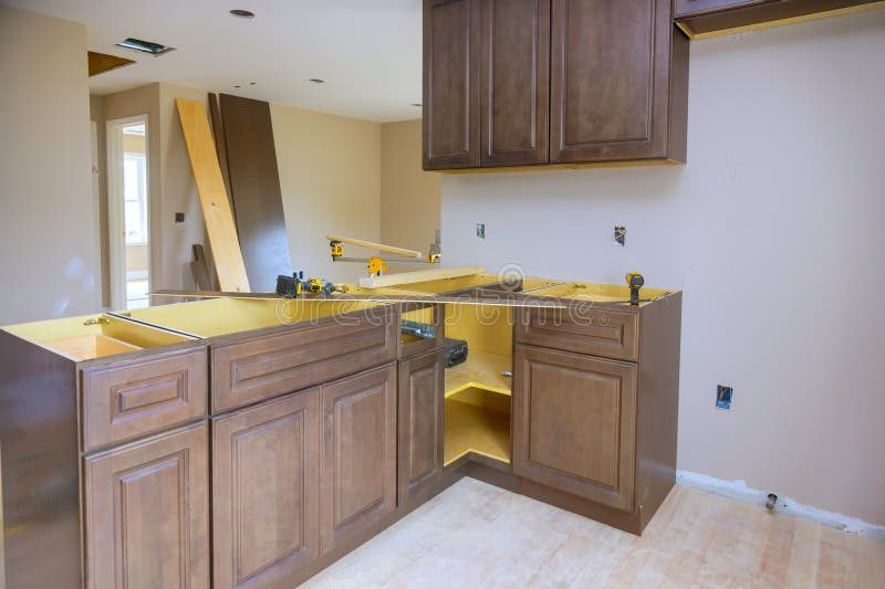 Assembly of New Custom Kitchen Cabinets during Construction a Home ...