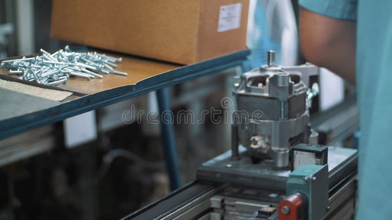 Assembly Operator Working on Production Line at Manufacturing Factory ...