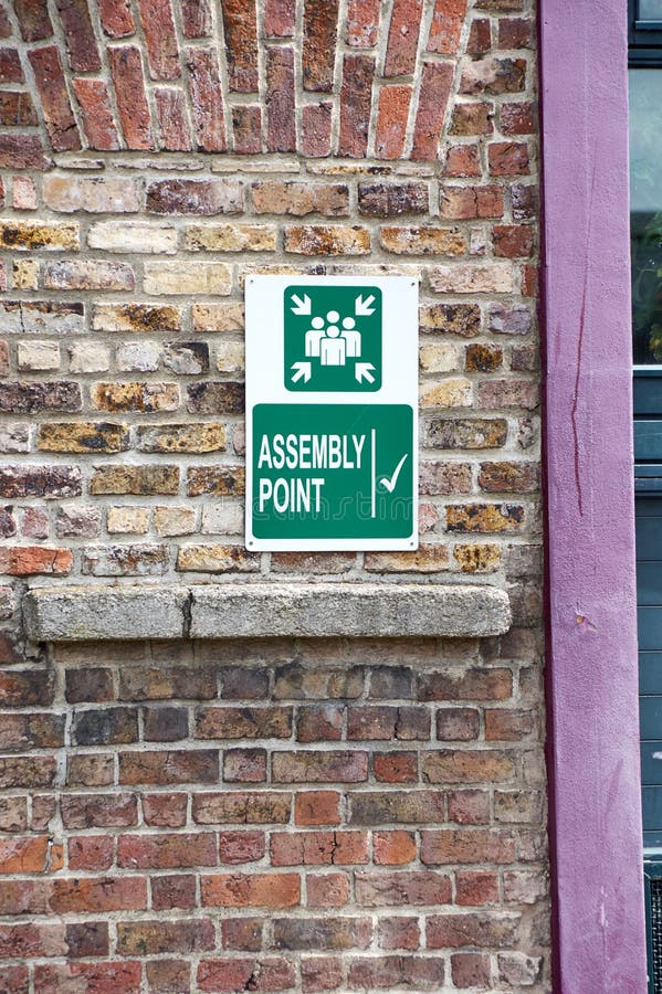 Assembly point sign stock photo. Image of emergency, notice - 98371720