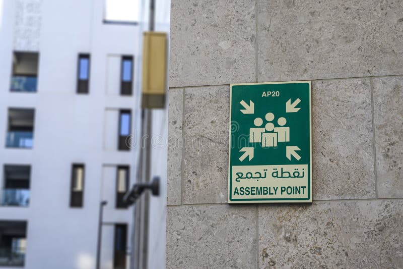 Assembly Point Sign on the Building Wall Stock Photo - Image of street ...