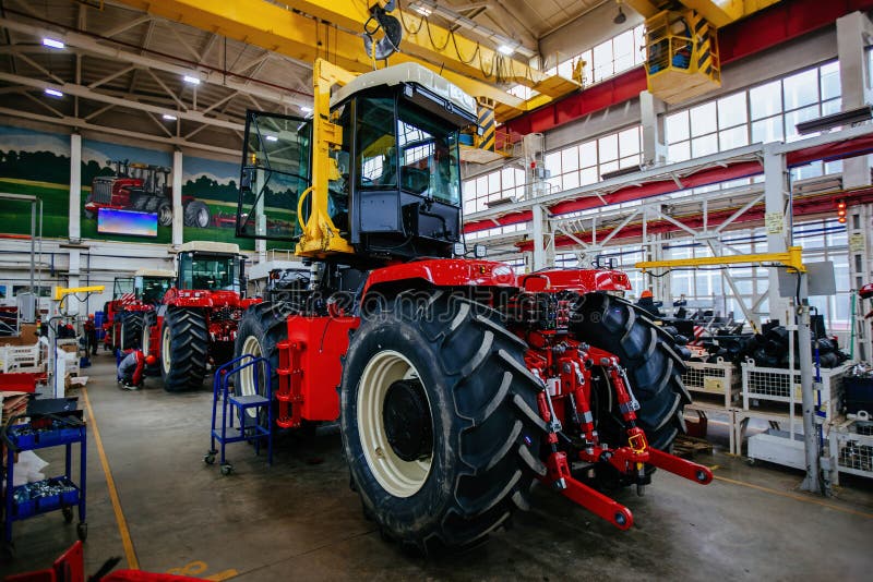 Assembly Process of Agricultural Tractors in Industrial Workshop Stock ...