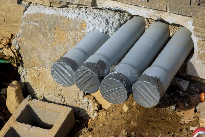 During the Assembly Process, a New Plastic Sewer Pipe is Being ...